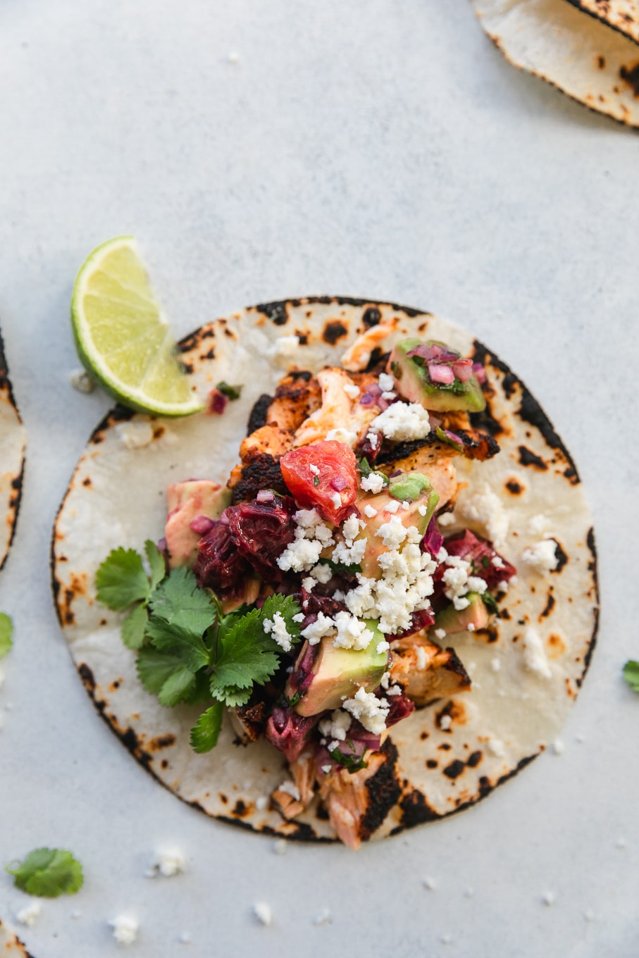 Blackened Salmon Tacos with Blood Orange Avocado Salsa and Queso Fresco