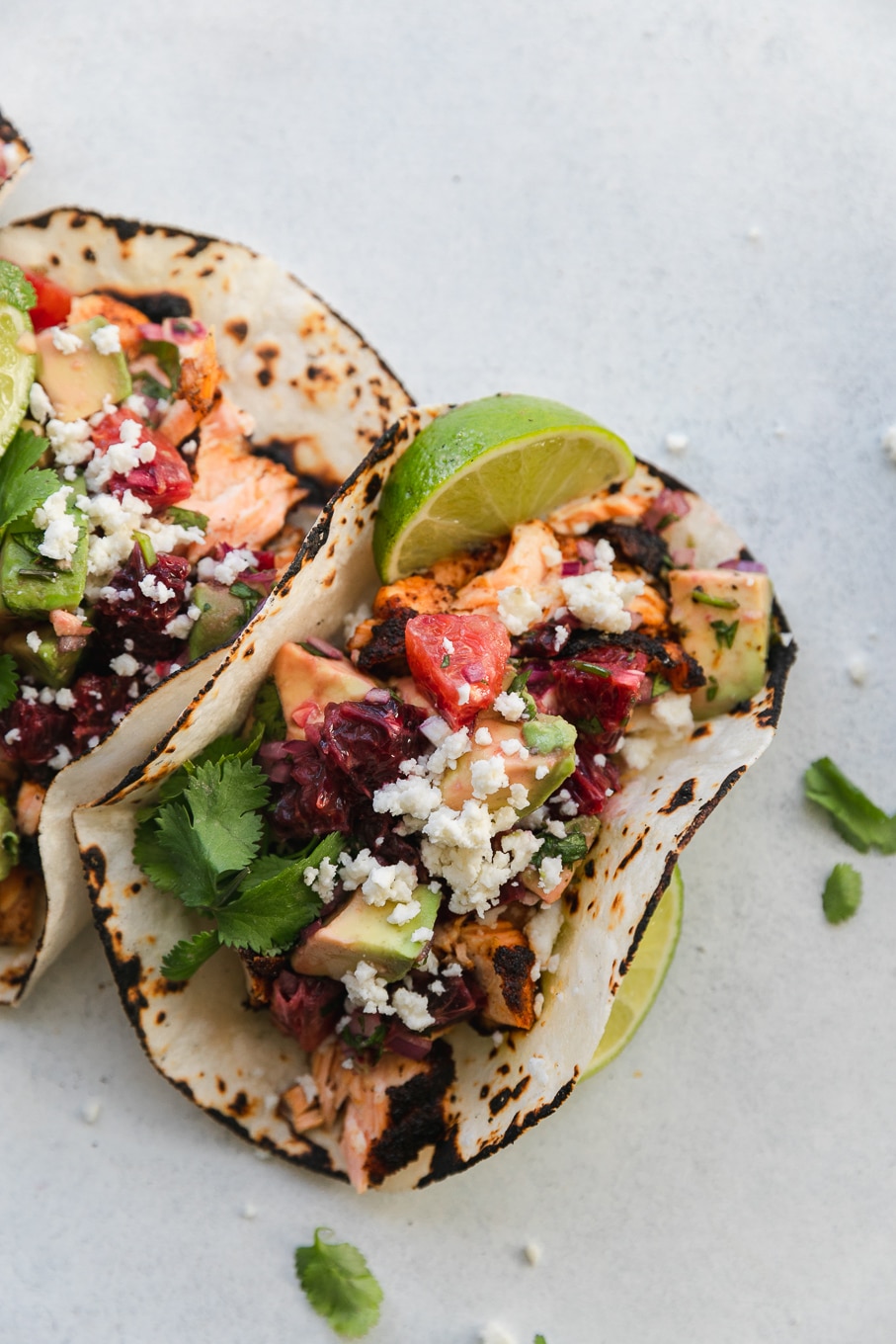 Blackened Salmon Tacos with Blood Orange Avocado Salsa and Queso Fresco